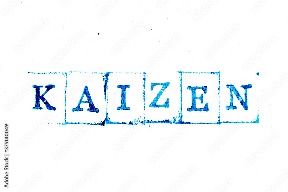 Blue color ink of rubber stamp in word kaizen on white paper background ...