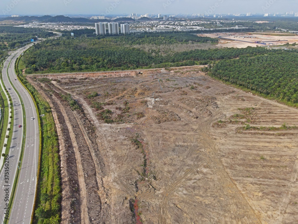 An aerial view of land clearing and deforestation at Iskandar Puteri of ...