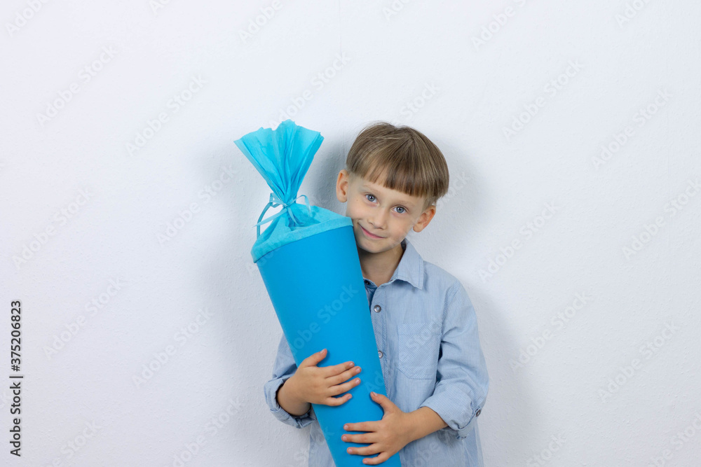Children with traditional German candy cone on the first day of school ...