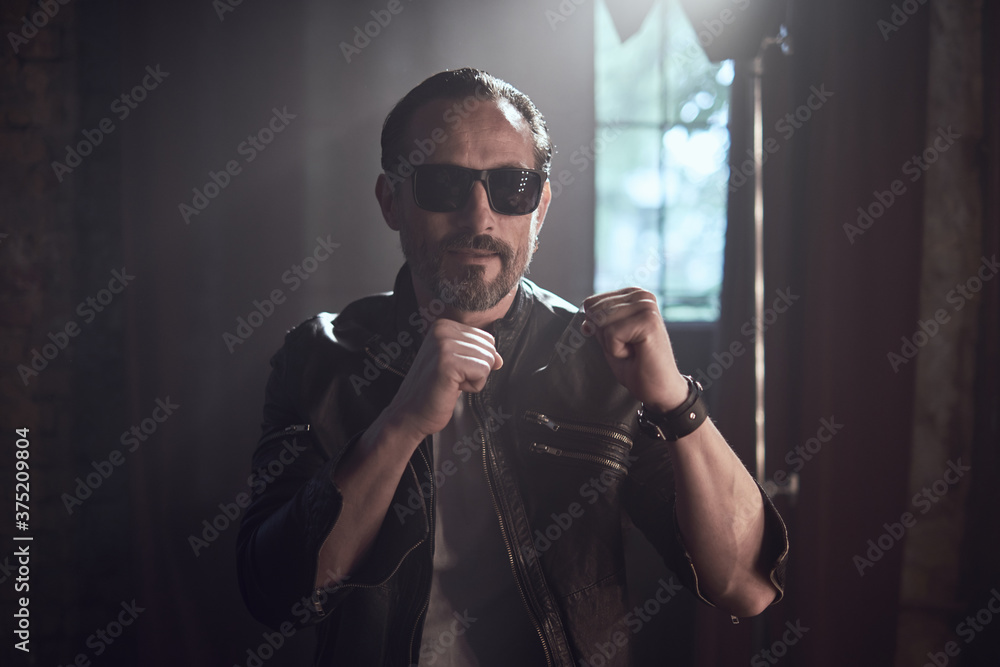 cinematic photo shoot of the confident actor celebrity look in foggy ...