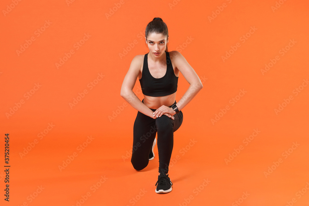Full length portrait of strong attractive young fitness sporty woman in ...