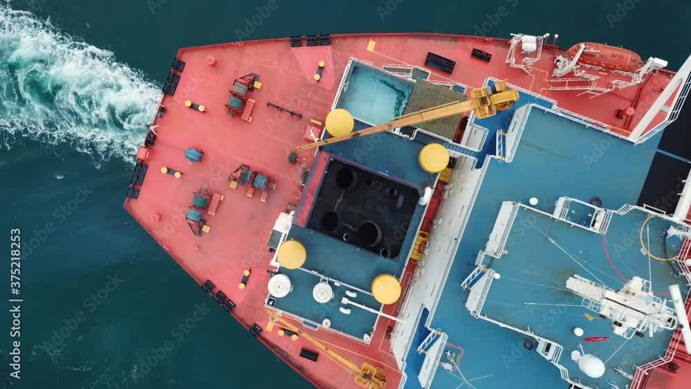 Flying over the crude oil tanker. Funnel, radar mast and stern of cargo ...