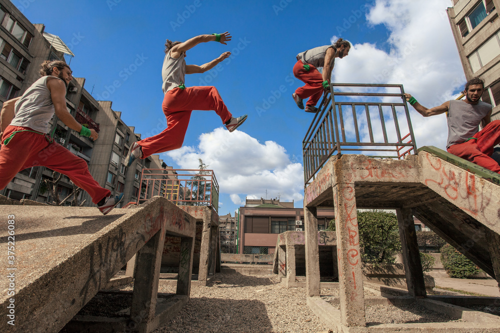 Young Man Jumping Stock Photo | Adobe Stock