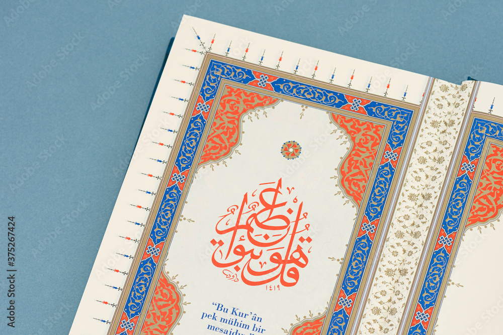 Holy quran, Islamic book, close-up detail. Stock Photo | Adobe Stock