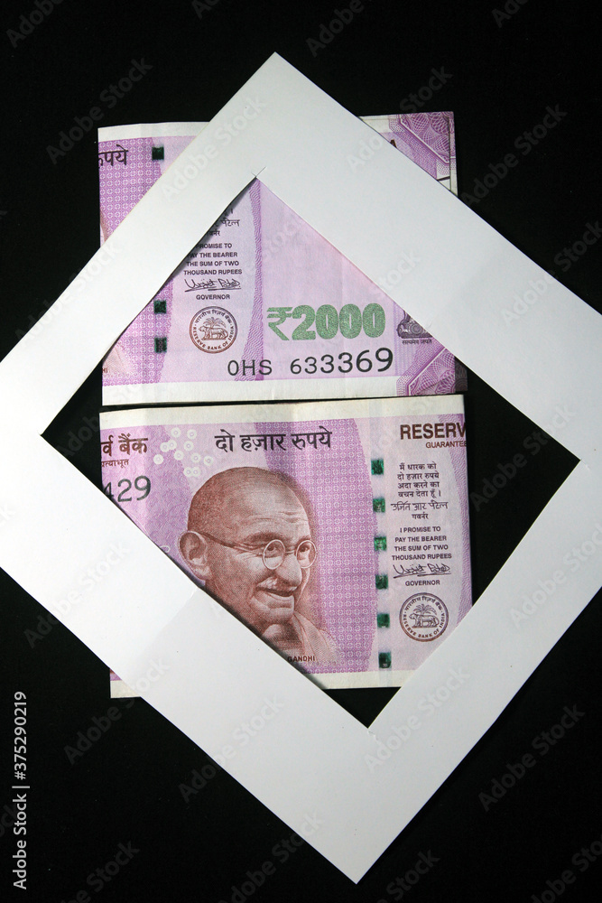 New Indian currency. 2000 rupee note. Indian currency isolated on black ...