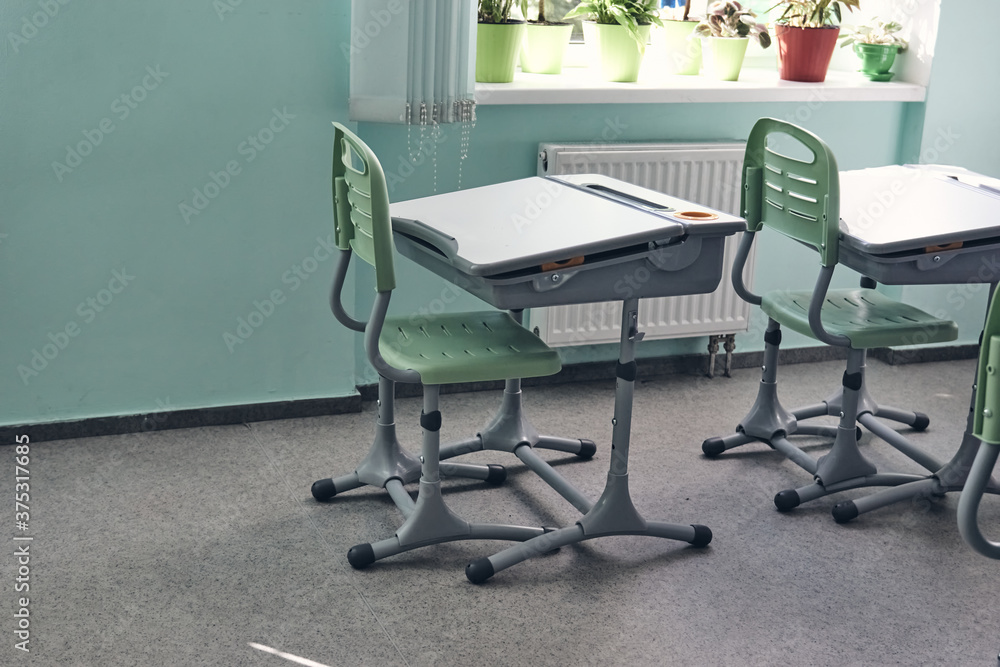 Moderd school smart classroom without young student.View of elementary ...