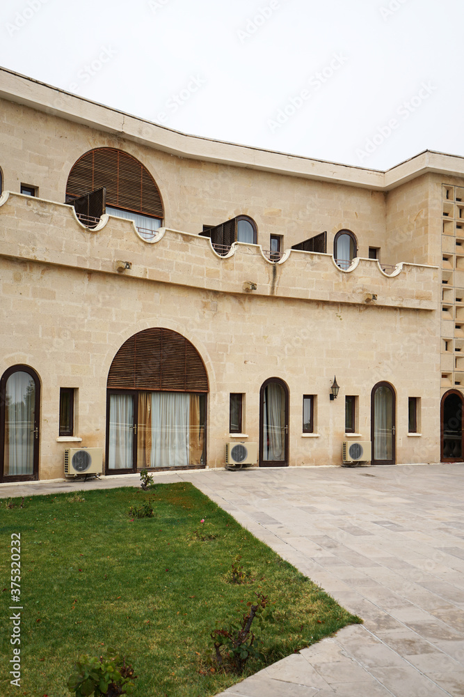 Exterior architecture and garden patio design of Turkish carved rock ...