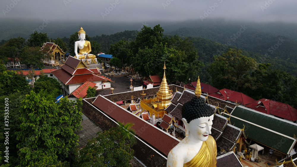 What Phra That Doi Kham literally means "Temple of the Golden Mountain ...