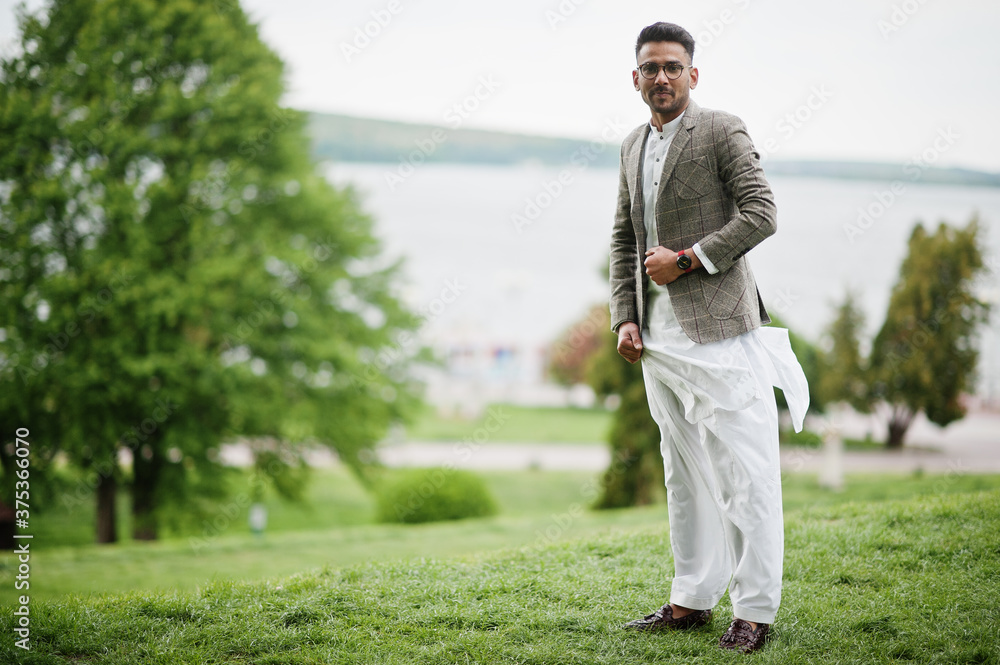 Stylish pakistani man wear in eyeglasses and jacket. Stock Photo ...