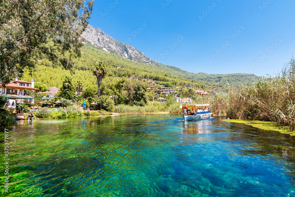 Taking tour on Azmak Stream in Akyaka Village. Akyaka is popular ...