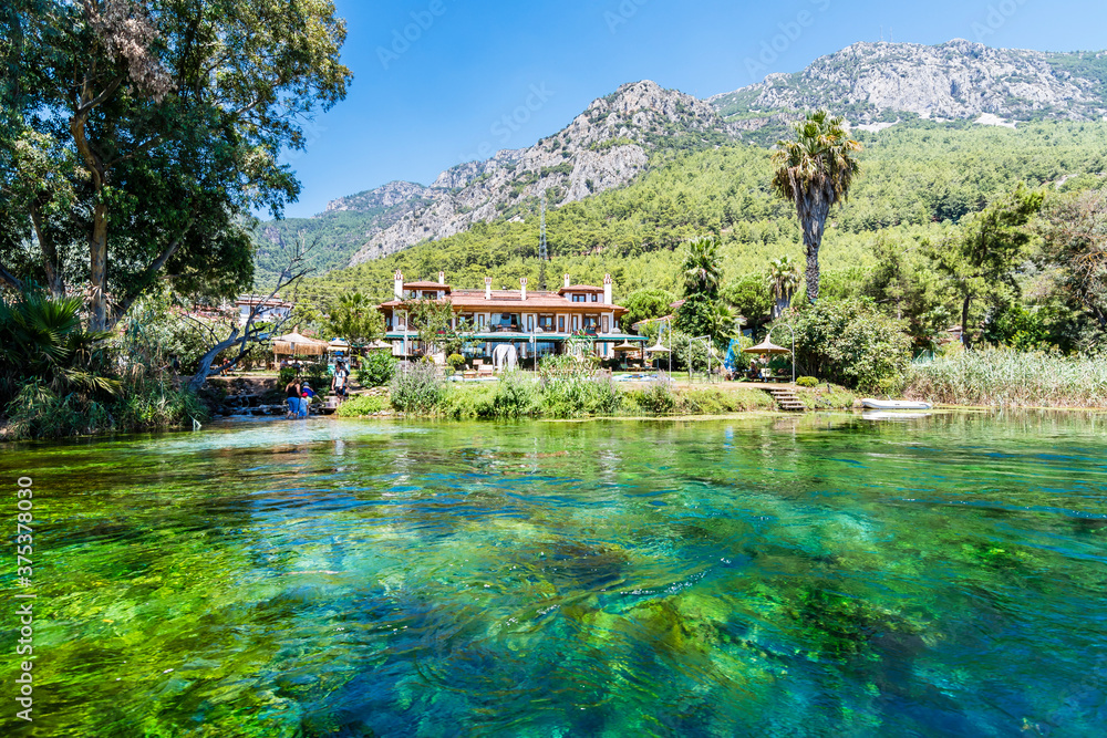 Taking tour on Azmak Stream in Akyaka Village. Akyaka is popular ...
