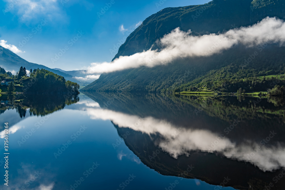 Gorgeous, mountain lake and fjord scenery along the Gaular River Valley ...