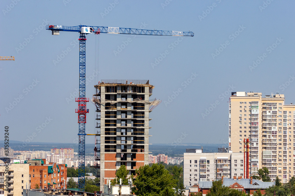The skeleton of a new multi-storey residential building under ...