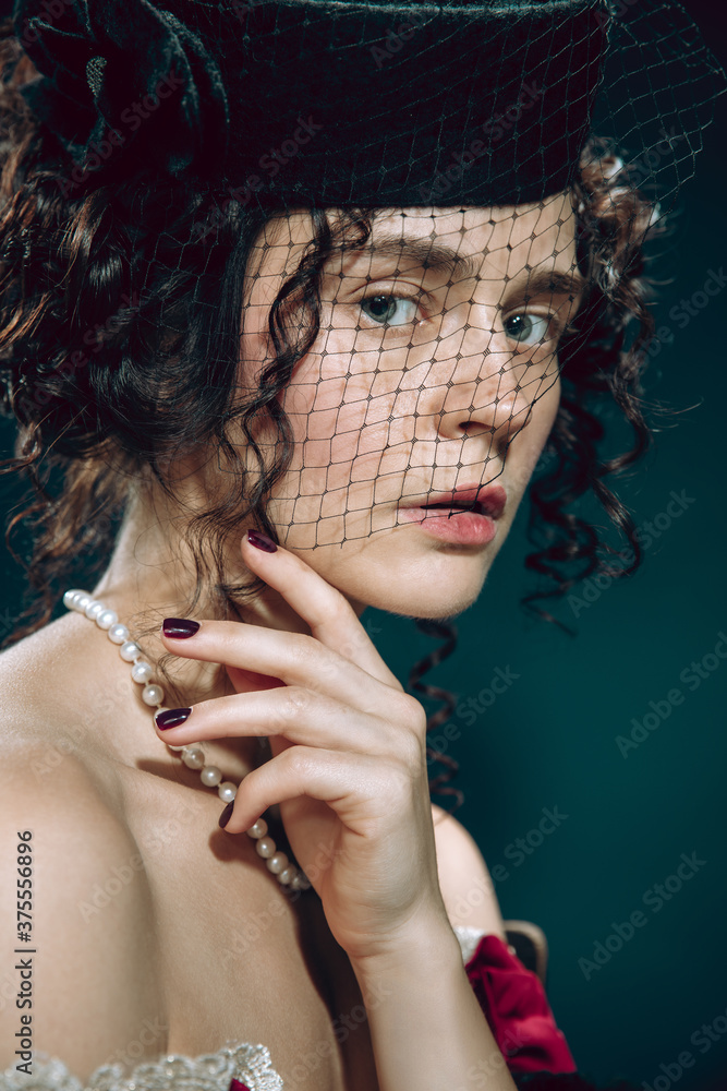 Love tragic. Young woman as Anna Karenina isolated on dark blue ...