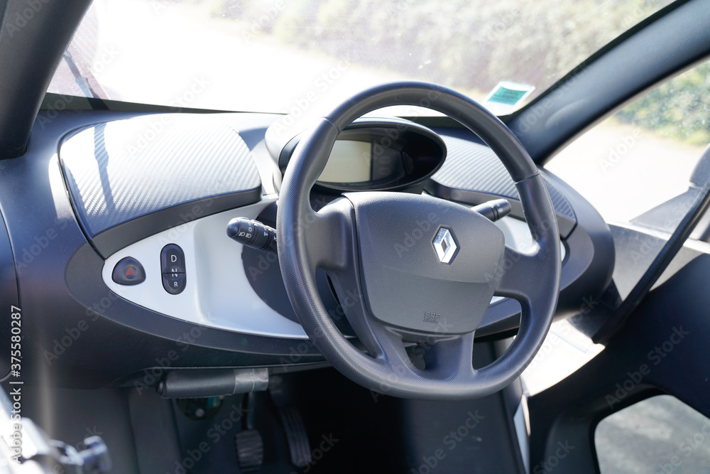 Renault Twizy mini electric car interior with dashboard and steering ...