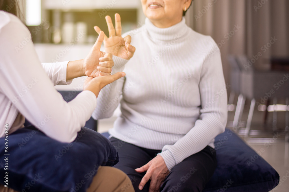Sign language specialist talking with mature patient deaf hearing and ...