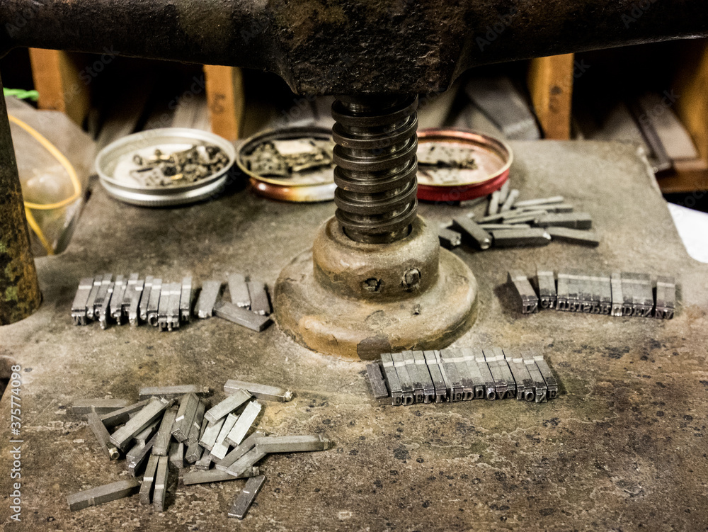 Lead press types on a vintage printing press Stock Photo | Adobe Stock