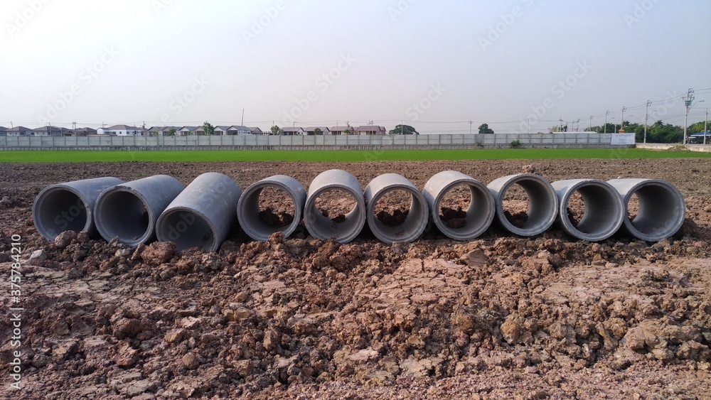 Concrete drainage pipes.Construction of main water supply pipeline ...