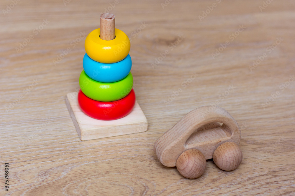 Wooden Car and stacking toy. Development games for children. Colorful ...