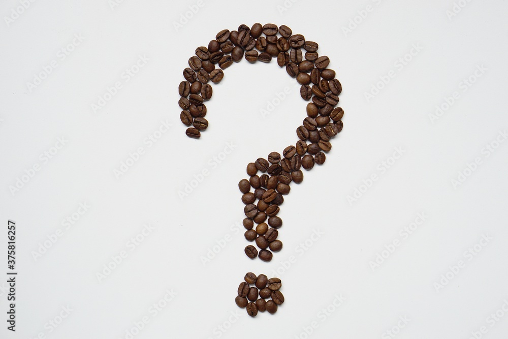 Question mark shape of coffee beans roasted on white background for ...