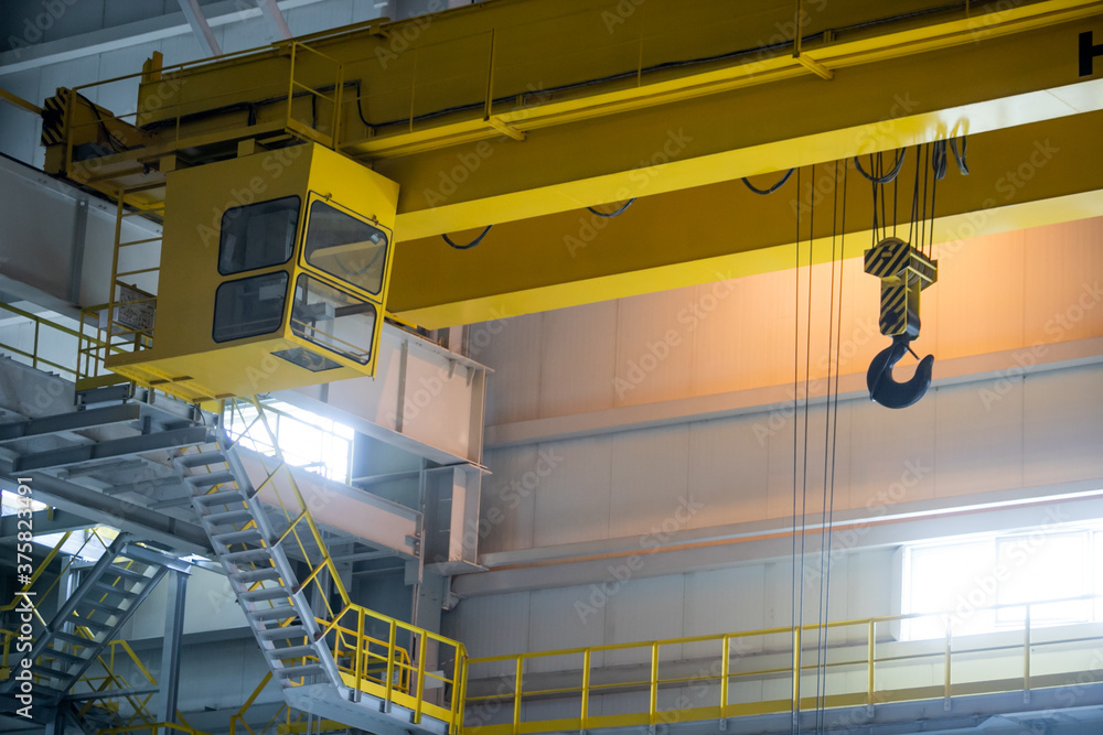 Swivel chain hook of electric hoist in workshop, chain block ...