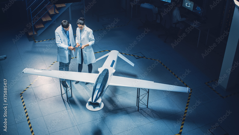 Two Aerospace Engineers Work On Unmanned Aerial Vehicle Drone Prototype ...