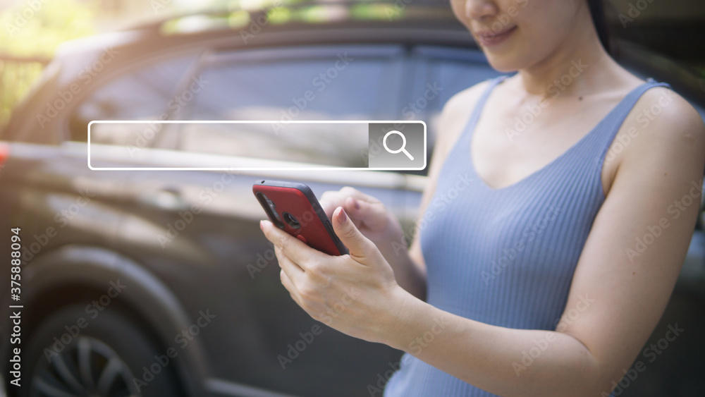 Hands using mobile phone or smartphone with with search box icon ...