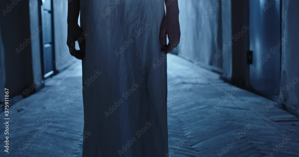 Little creepy girl in ghost costume staring at camera, wearing white ...