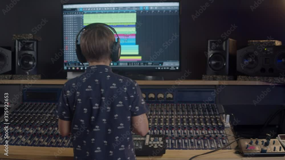 Music production studio. Art for kids. Kid working in the recording ...