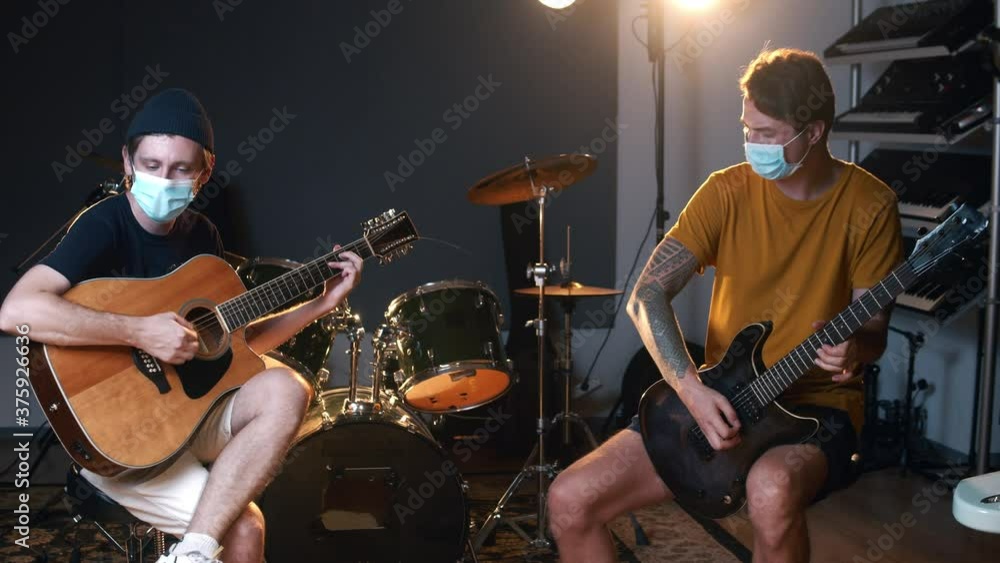 Professional music studio. Creative hobbies. Rehearsal of two young ...