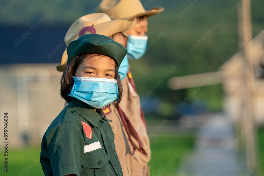 Boys Scouts wearing face mask during corona virus and flu outbreak. Boy ...