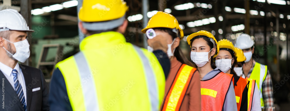 Temperature measurement with employee temperature meter before entering ...