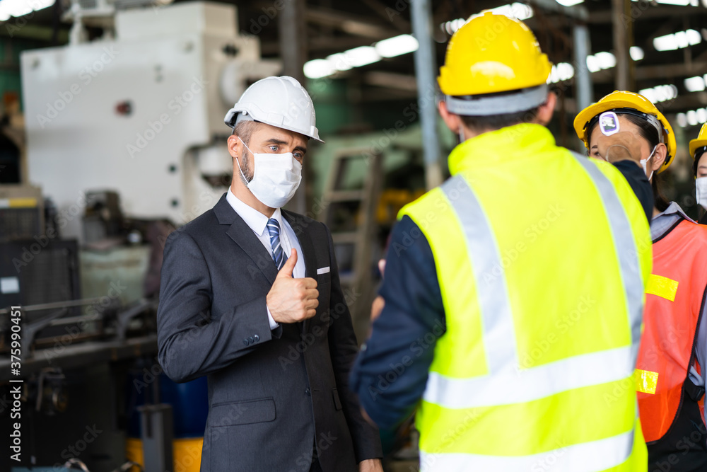 Temperature measurement with employee temperature meter before entering ...