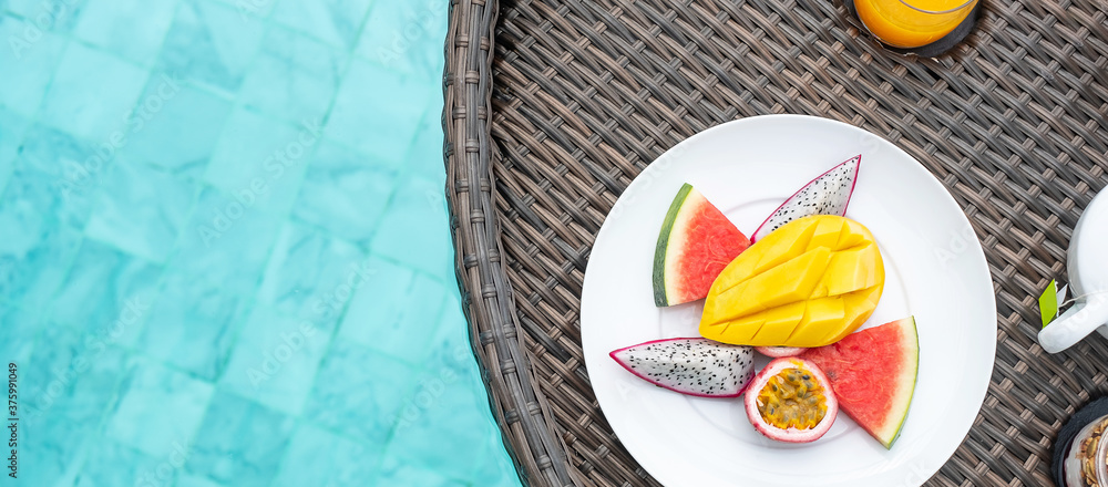 Floating Breakfast tray in swimming pool at luxury hotel or tropical ...