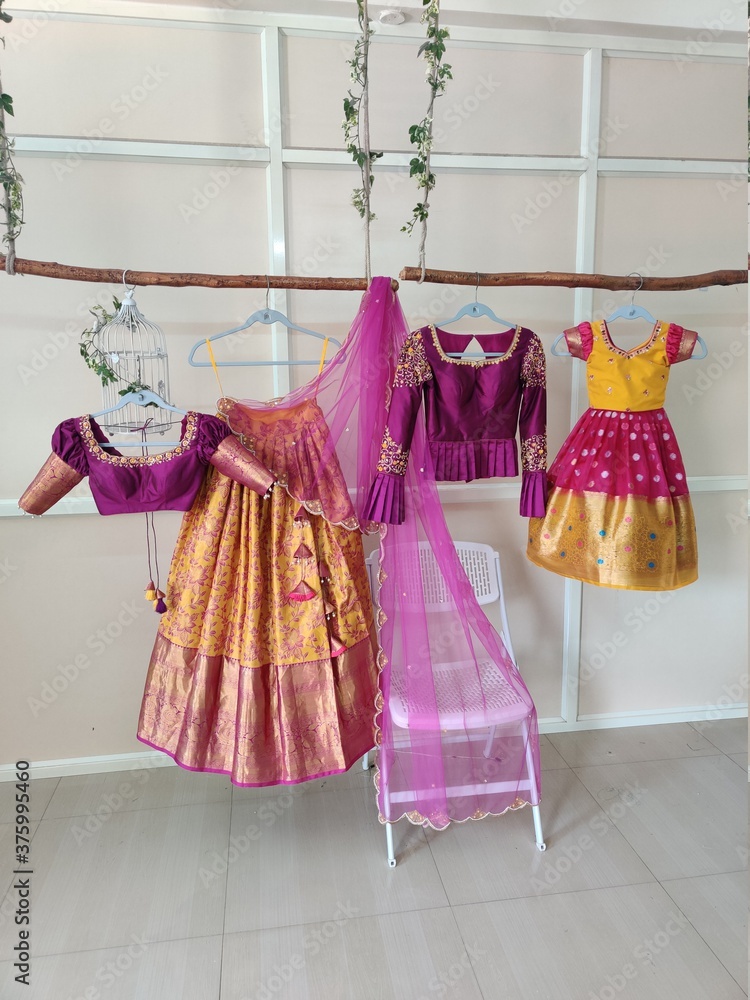 A beautiful set of clothes for a traditional Indian family mother and ...