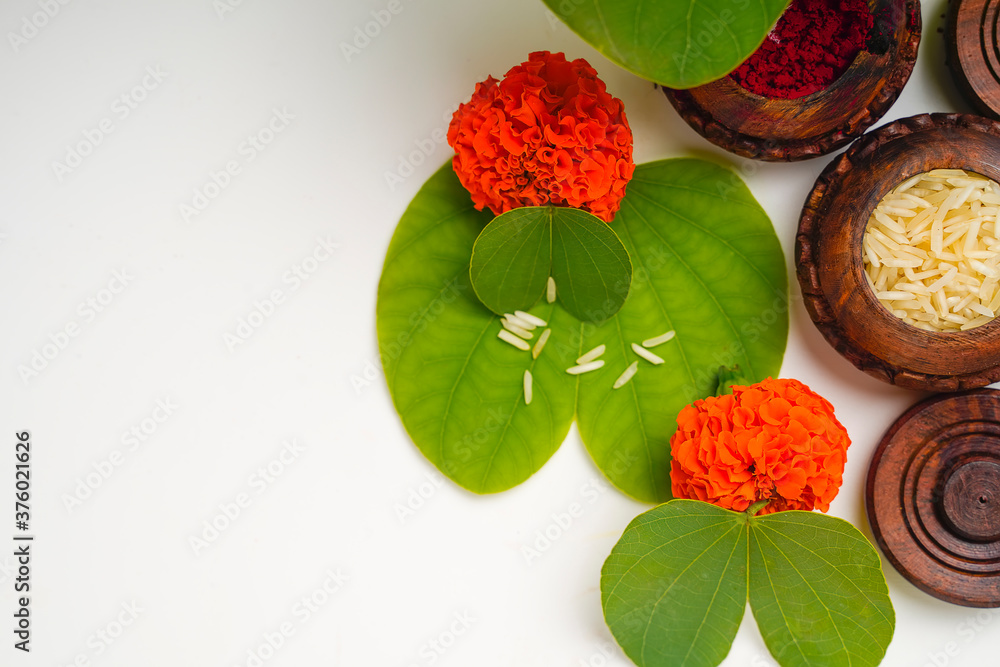 Happy Dussehra greeting card , green apta leaf and rice, Indian ...