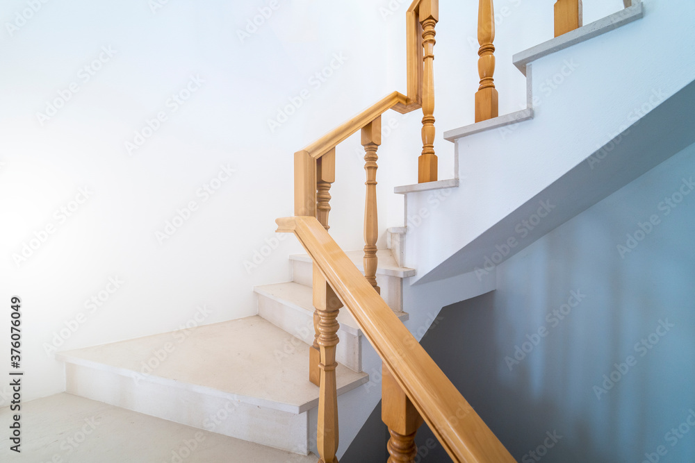 Contemporary stairway with wood handrail. Interior stairs. Staircase ...