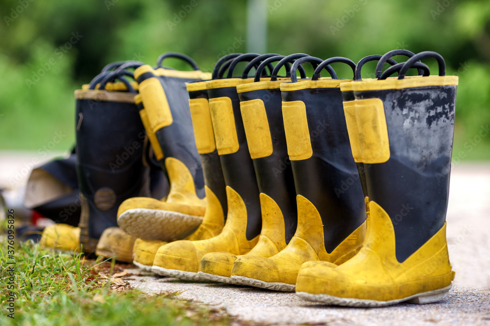 Fire Fighting Rubber Boots, Firefighter Boots of fireman team standing ...