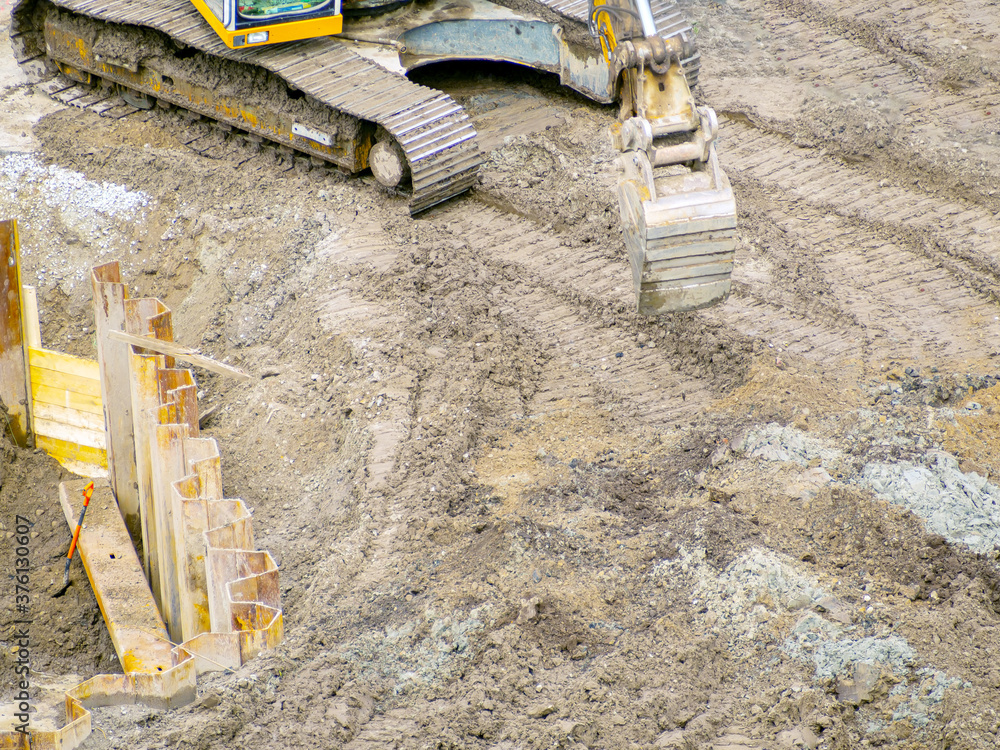 Excavator Tractor Digging A Trench. Stock Photo | Adobe Stock