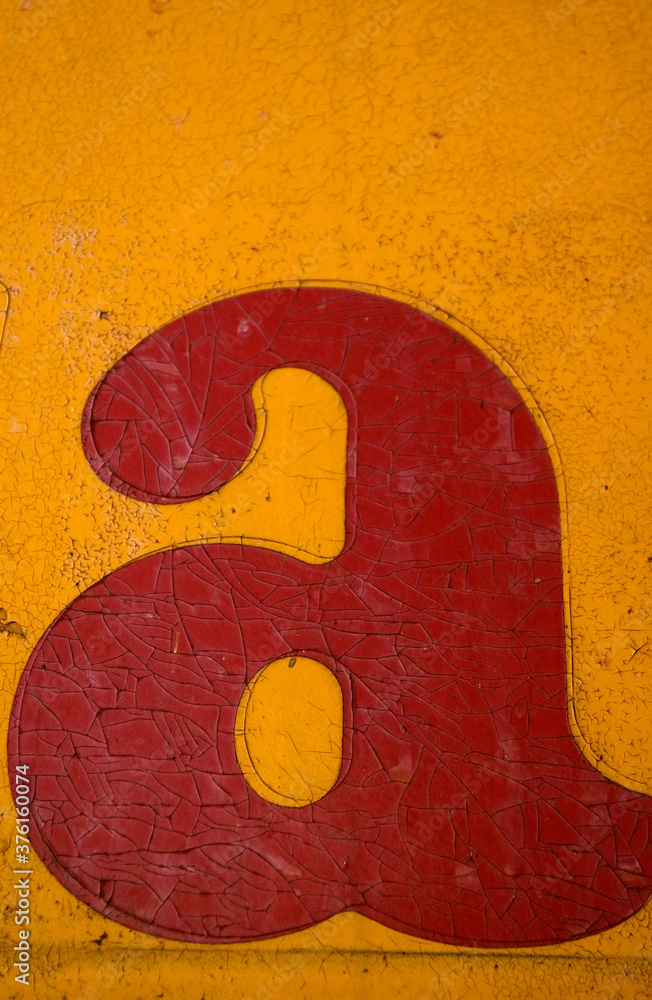Old, faded, worn and used letters, alpha numeric set character that ...