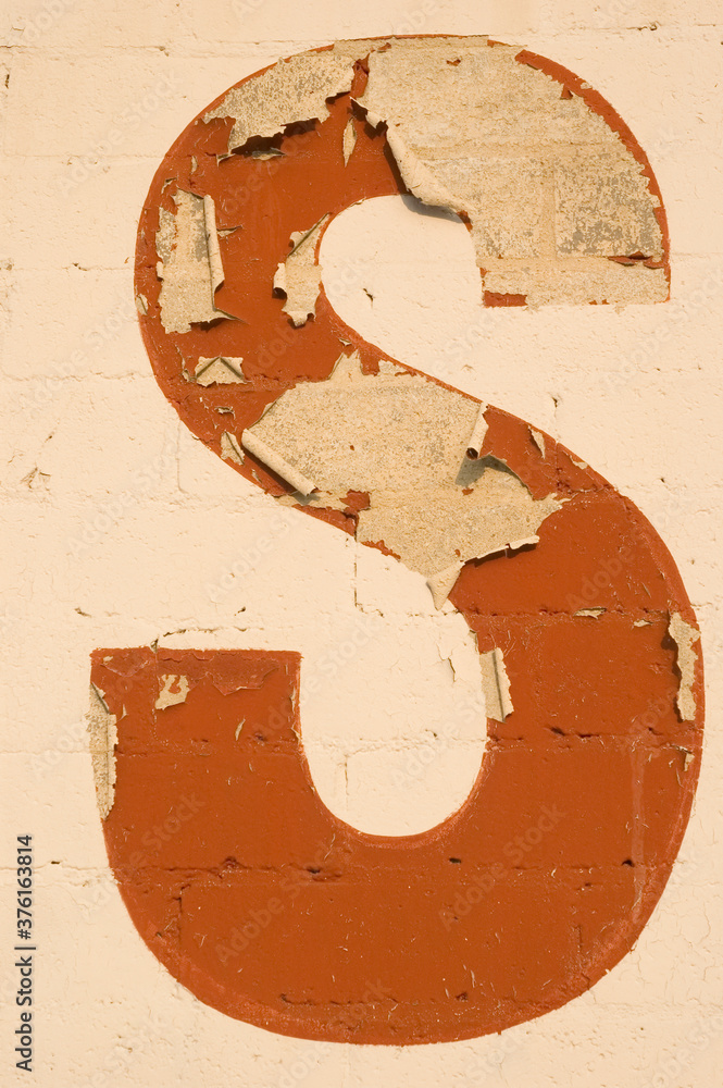 Old, faded, worn and used letters, alpha numeric set character that ...