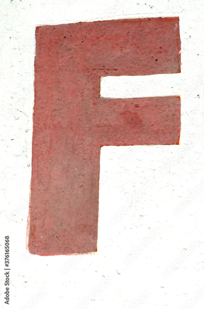 Old, faded, worn and used letters, alpha numeric set character that ...