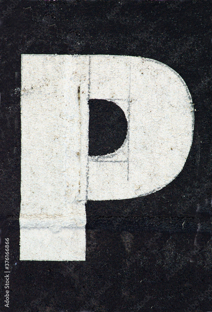 Old, faded, worn and used letters, alpha numeric set character that ...