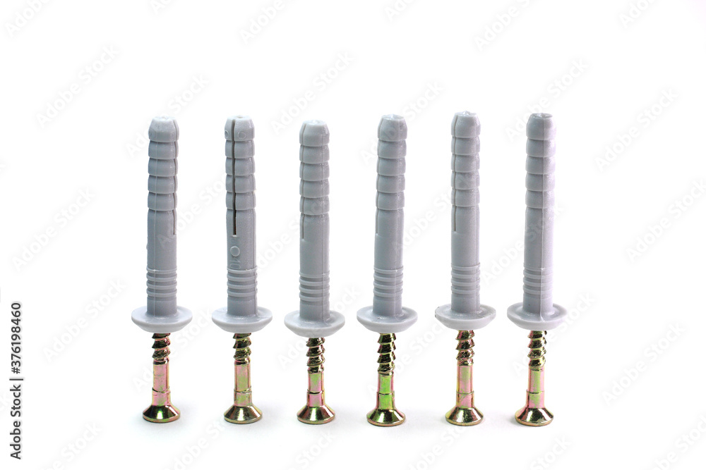 Wall in the row on white. Anchor or dowel isolated. Fastener (screw ...