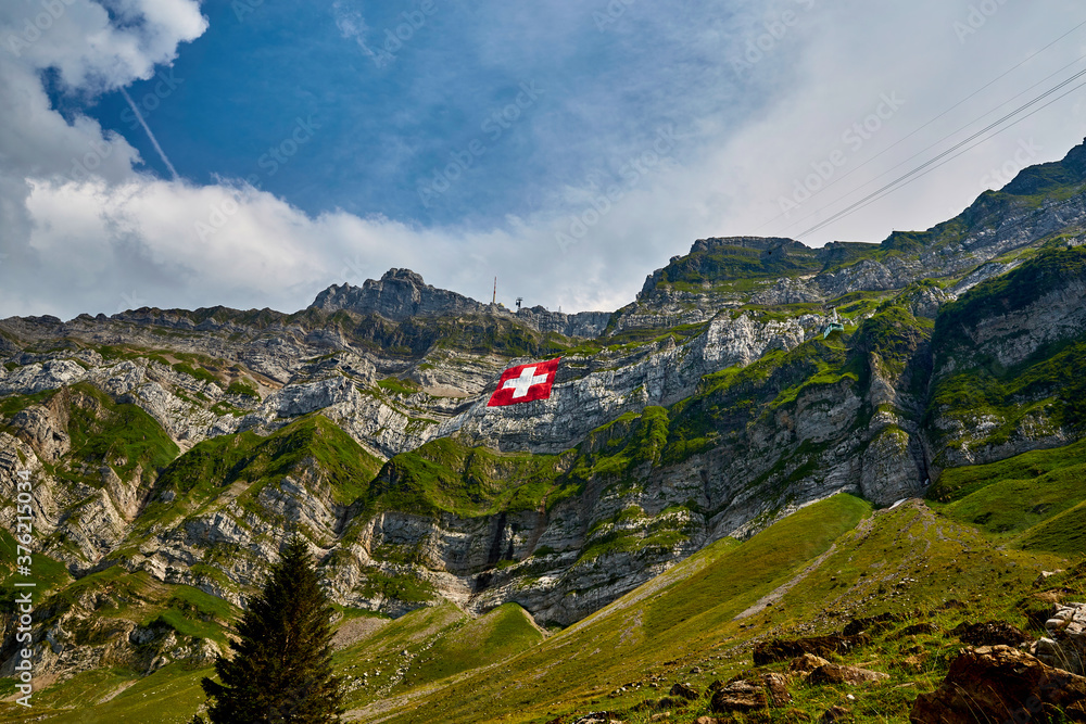 Schweizer Fahne am Felsen - Säntis Stock Photo | Adobe Stock