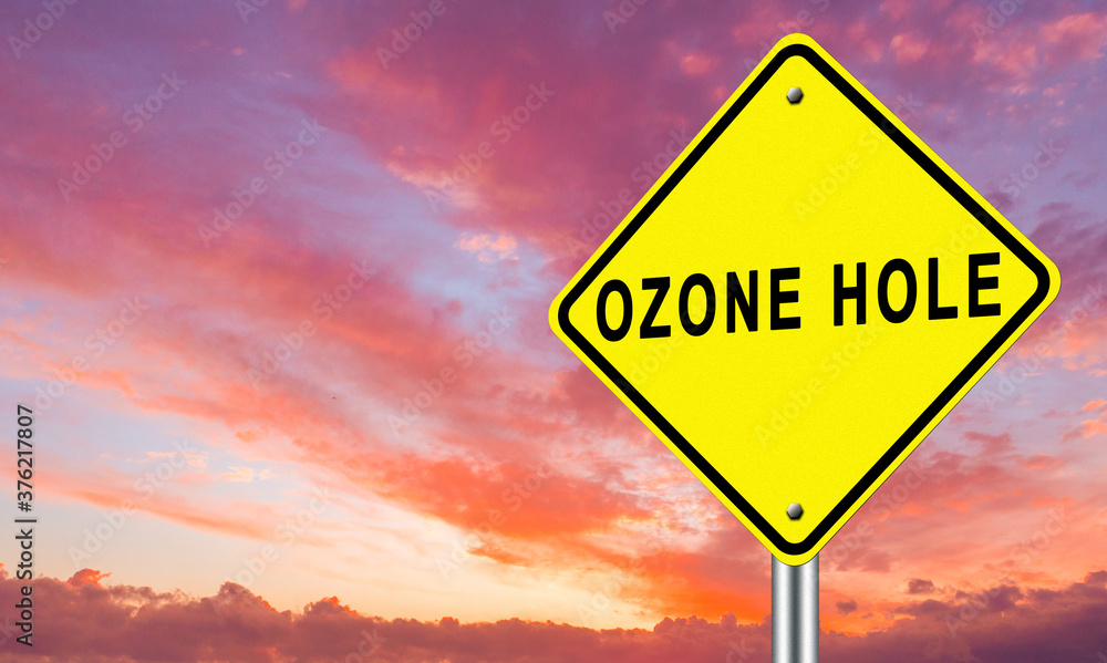 Ozone hole warning sign on sky background. Concept - local drop in ...