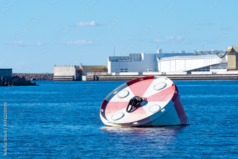 Buoy in the sea. Sea buoy. Floating sign in the Bay. Fencing of the ...