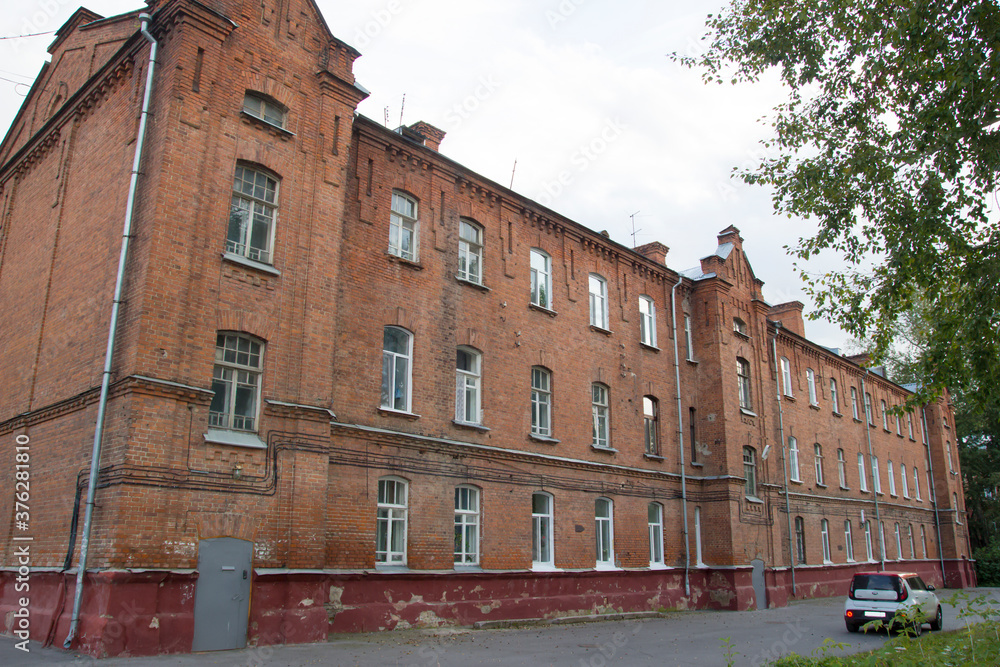 Old brick building in the Siberian city of Tomsk. The street of the ...