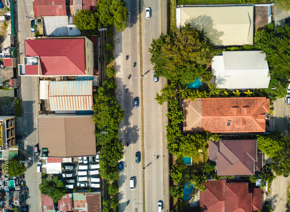 Las Pinas and Muntinlupa boundary separtaed by Daang Hari Road. Top ...