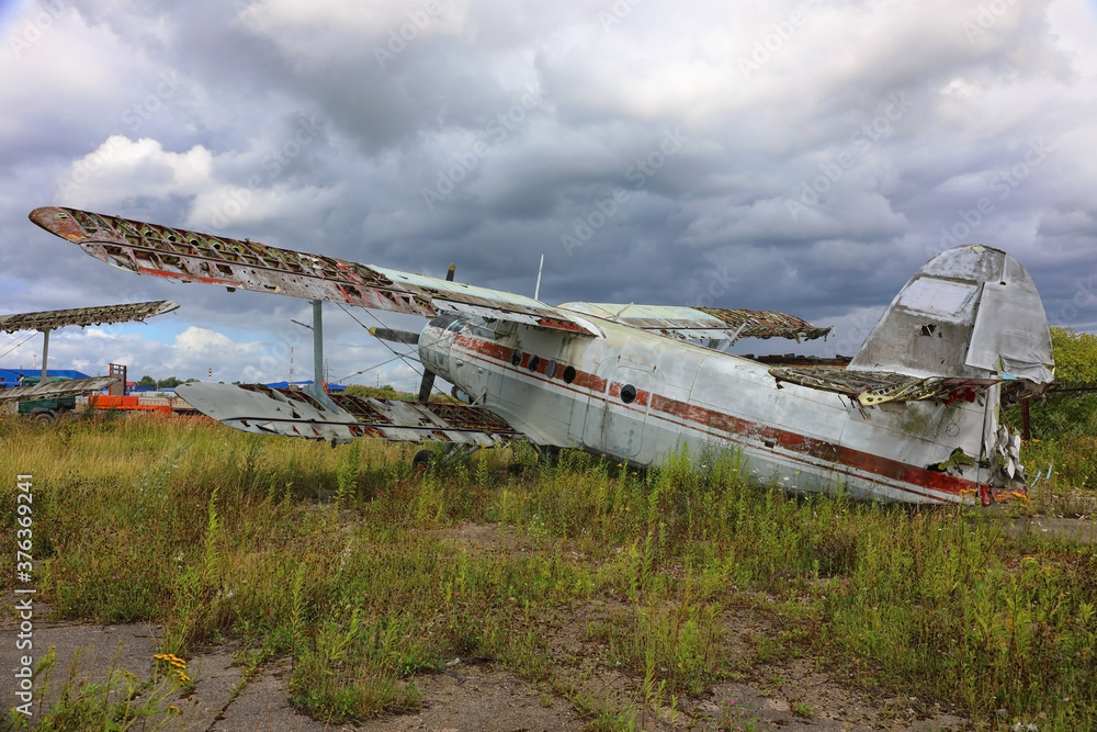 Old crashed and abandoned small propeller plane at the airplane ...